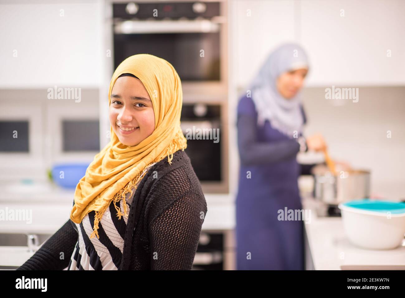 Group of Muslim women in kitchen making food Stock Photo - Alamy