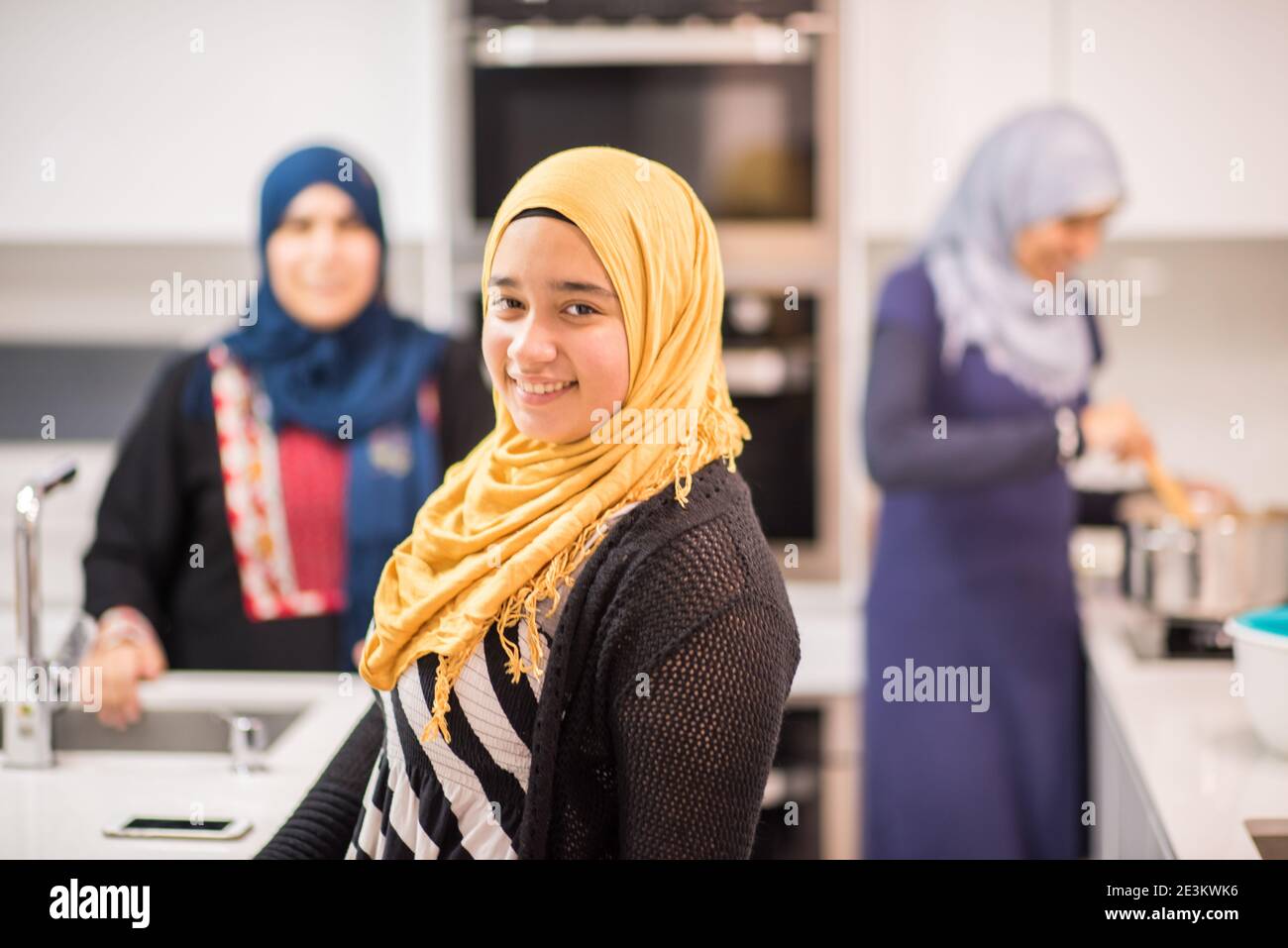 Group of Muslim women in kitchen making food Stock Photo - Alamy