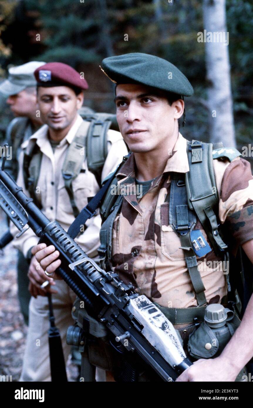 MAJ Raja Tanwir (left) of Pakistan and CPT Adel Afifi of Egypt participate in exercises during ...