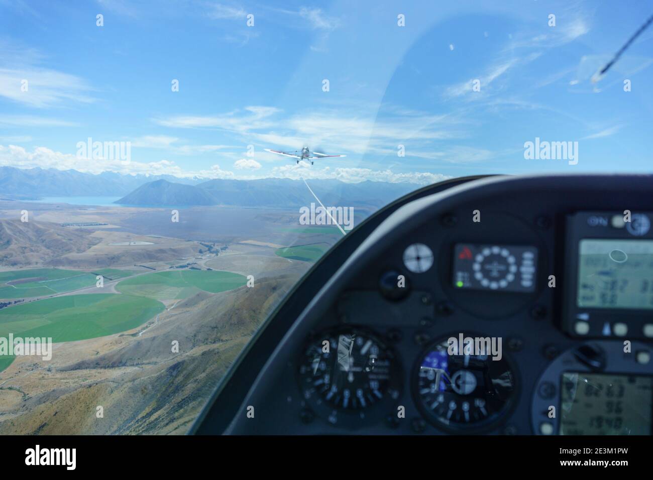 Hazy view through perspex canopy from with glider glider cockpit while ...