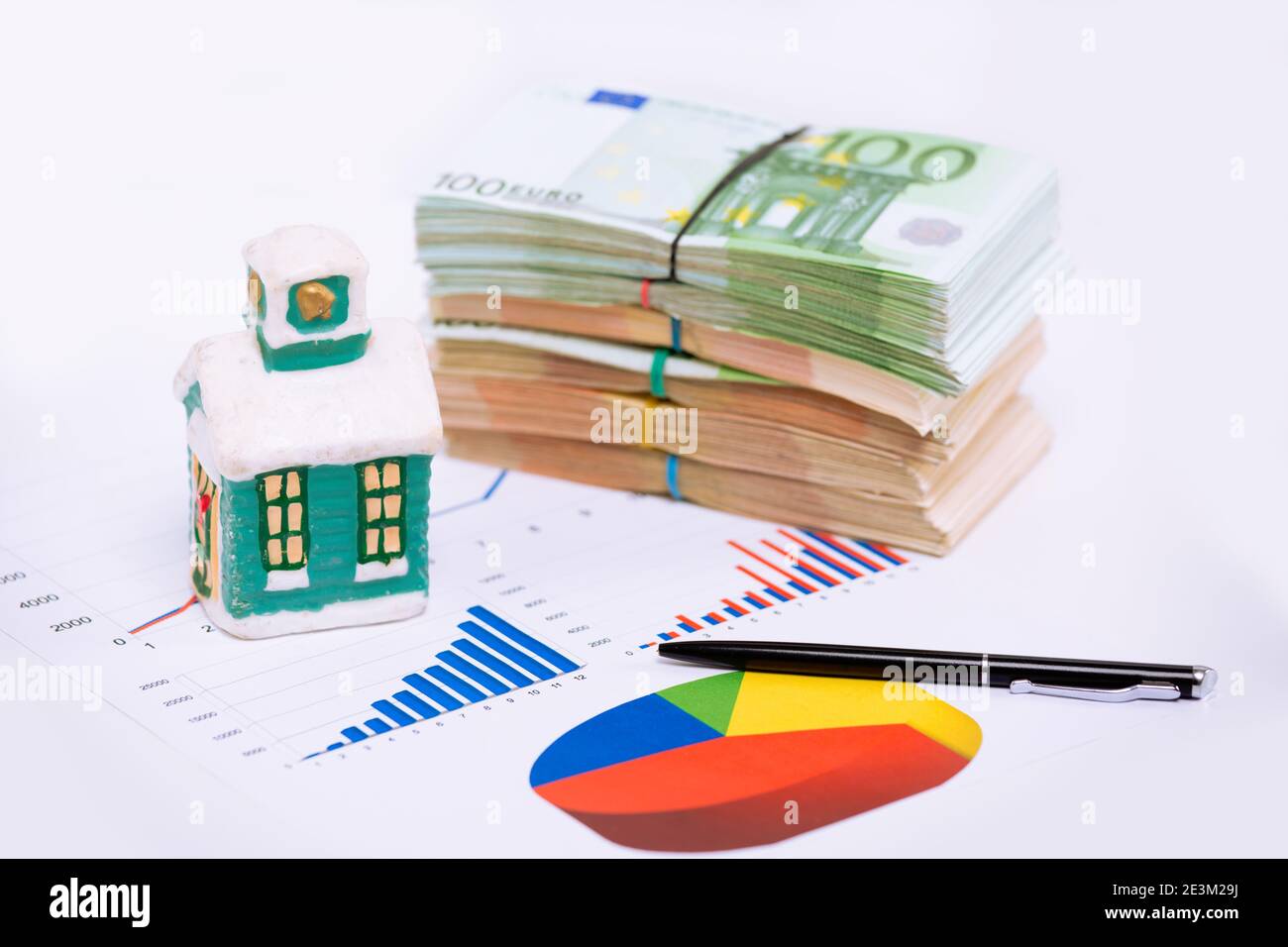 Stack pile of european money, Euro cash currency on a graphic chart and ...