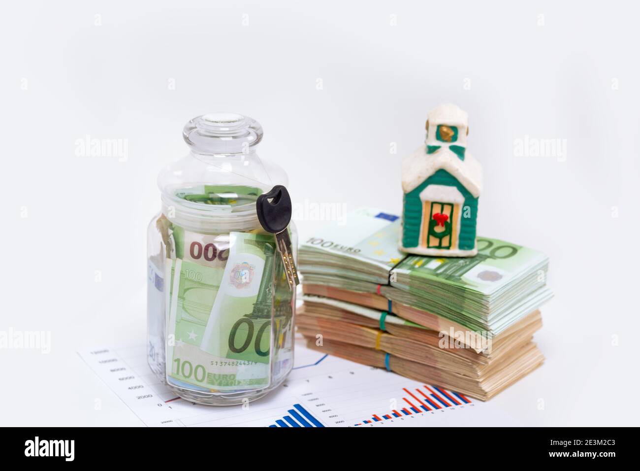 Stack pile of european money, Euro cash currency in a jar with a key on ...
