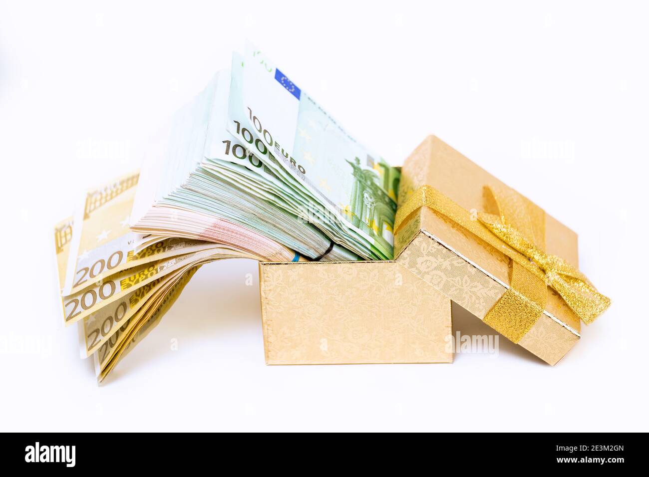 Stack pile of European union currency bills, euro banknotes in a golden ...