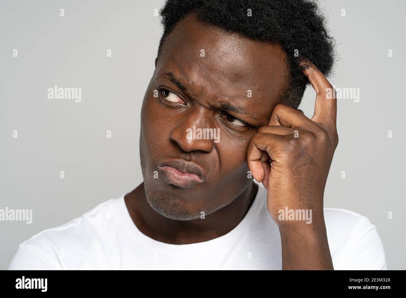 Unsure Doubtful Black Man Scratching Head Looking Left Doubtfully