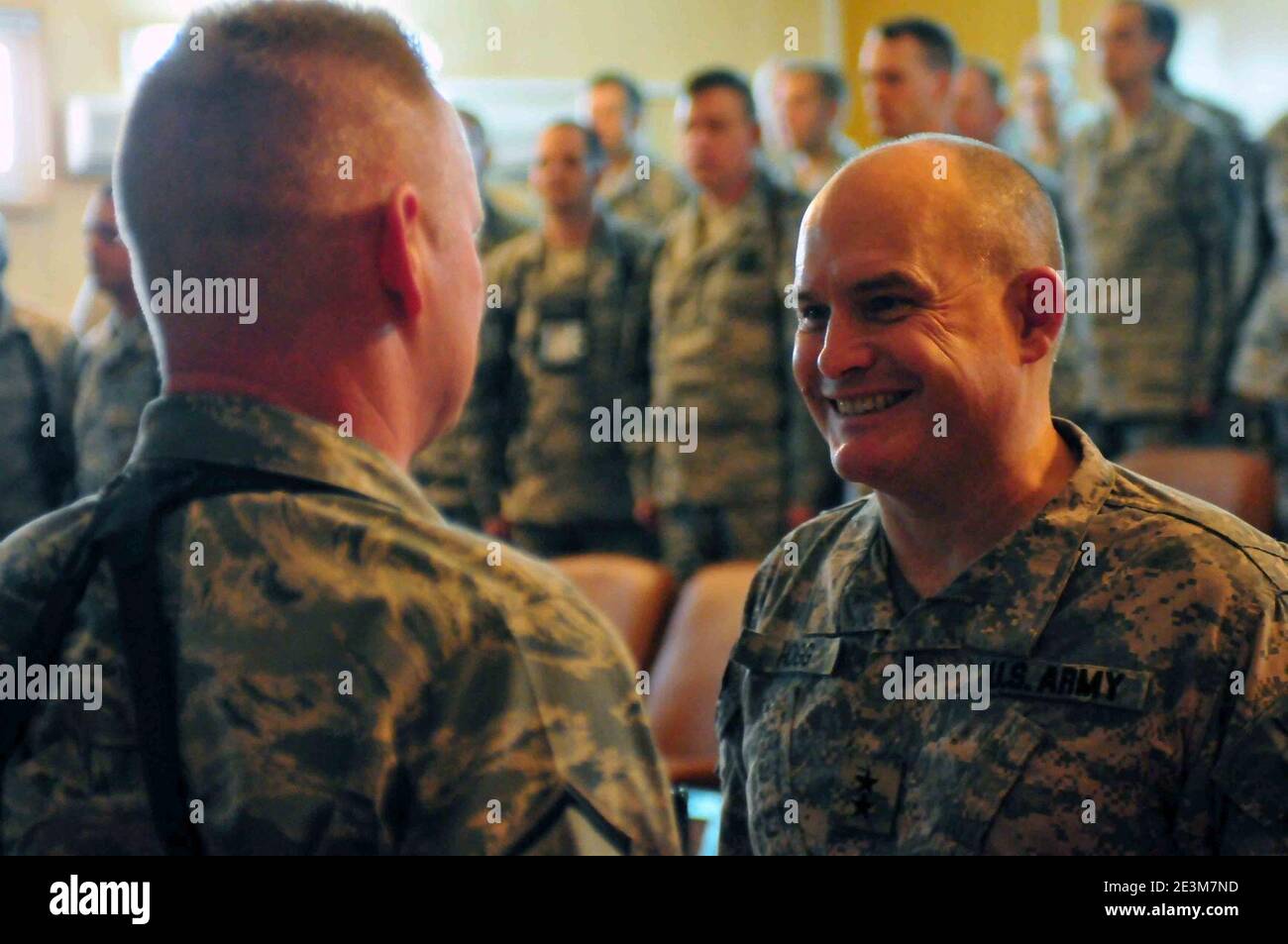 Maj. Gen. David Hogg presents a Joint Service Achievement medal to ...