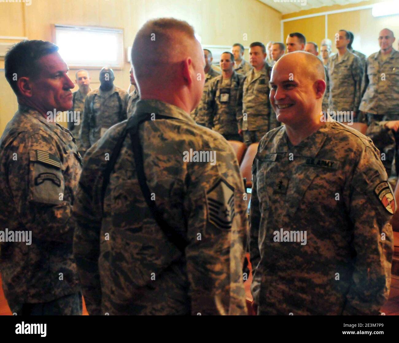 Maj. Gen. David Hogg presents a Joint Service Achievement medal to ...