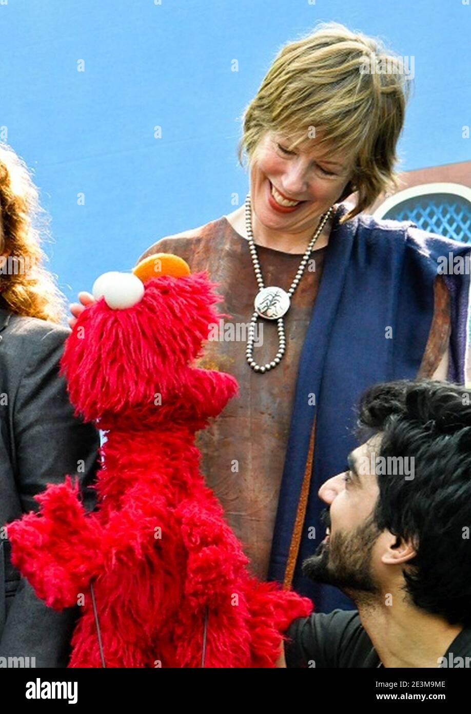 Marilyn Wyatt looks at a puppet of Pakistani children s TV show Sim Sim ...