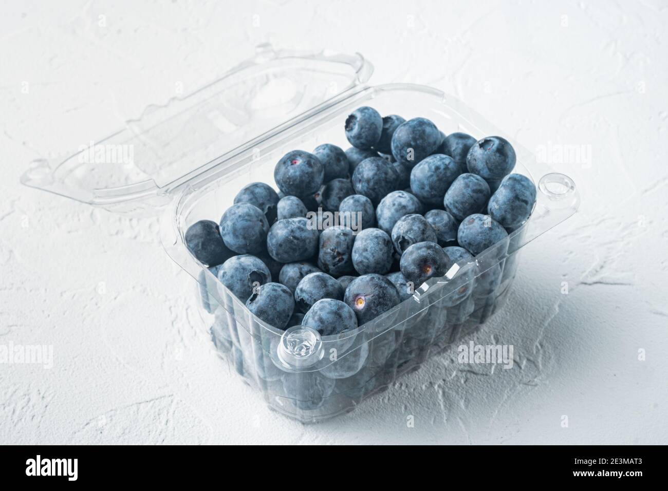 Organic blueberrie in plastic box package, on white background Stock ...
