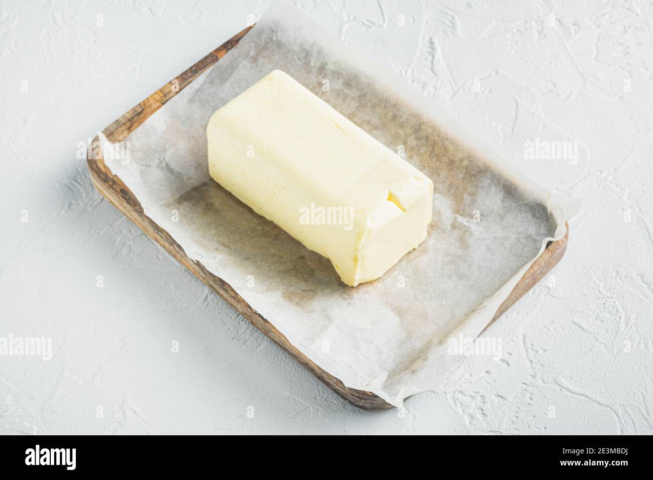 Rustic farmhouse inspired fresh butter, on white background Stock Photo ...