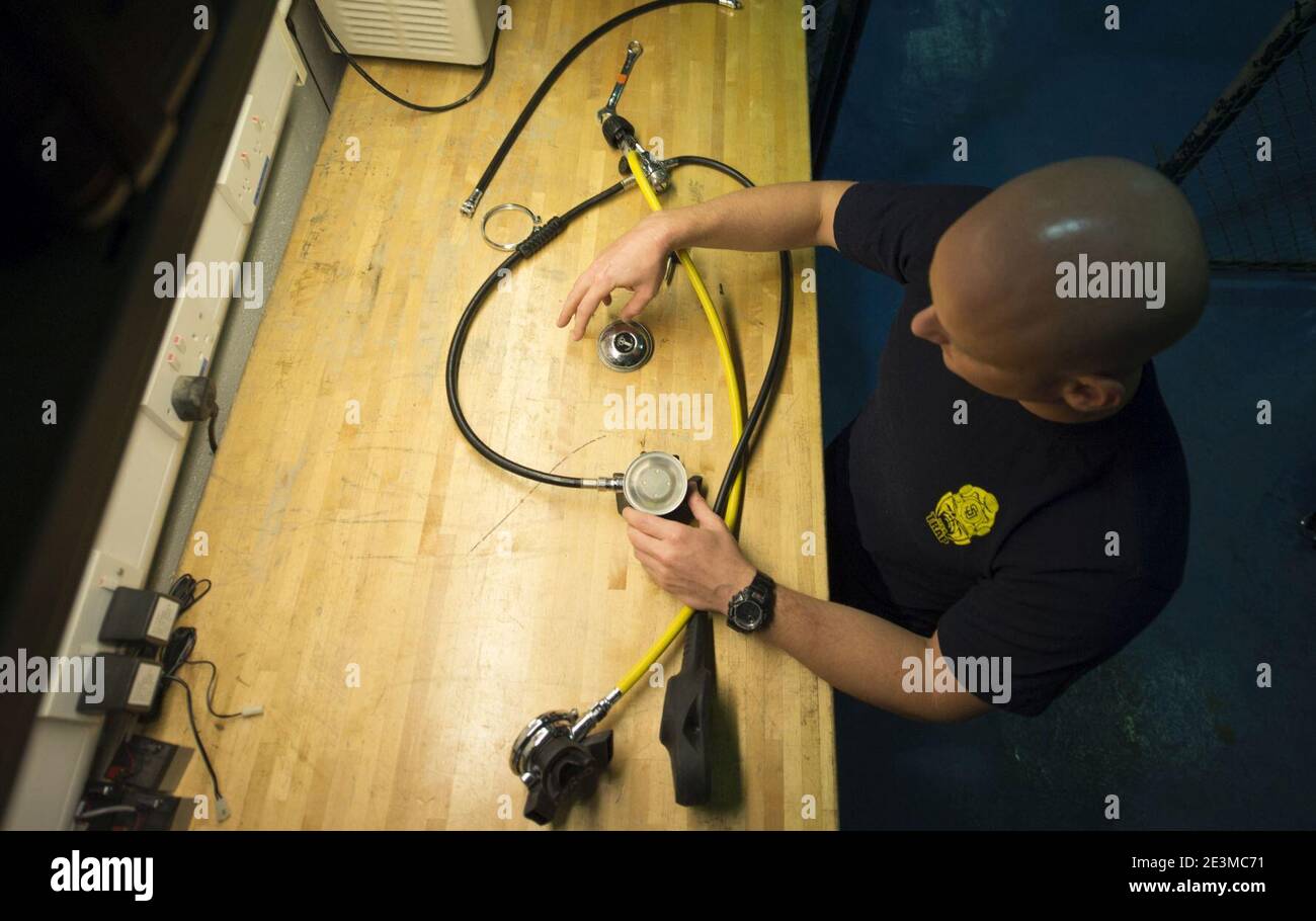 Maintenance on Dive Regulator 131009 Stock Photo - Alamy