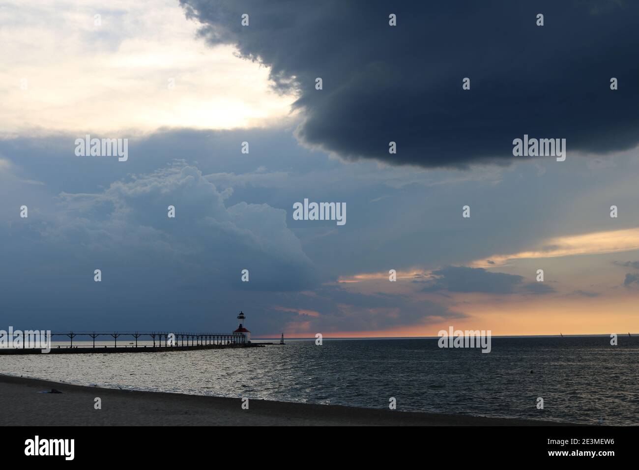 Dark storm cloud looming over Lake Michigan Stock Photo - Alamy