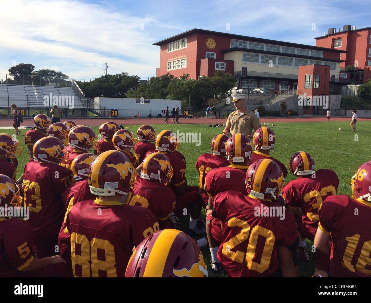 Marines motivating ALHS football team Stock Photo - Alamy