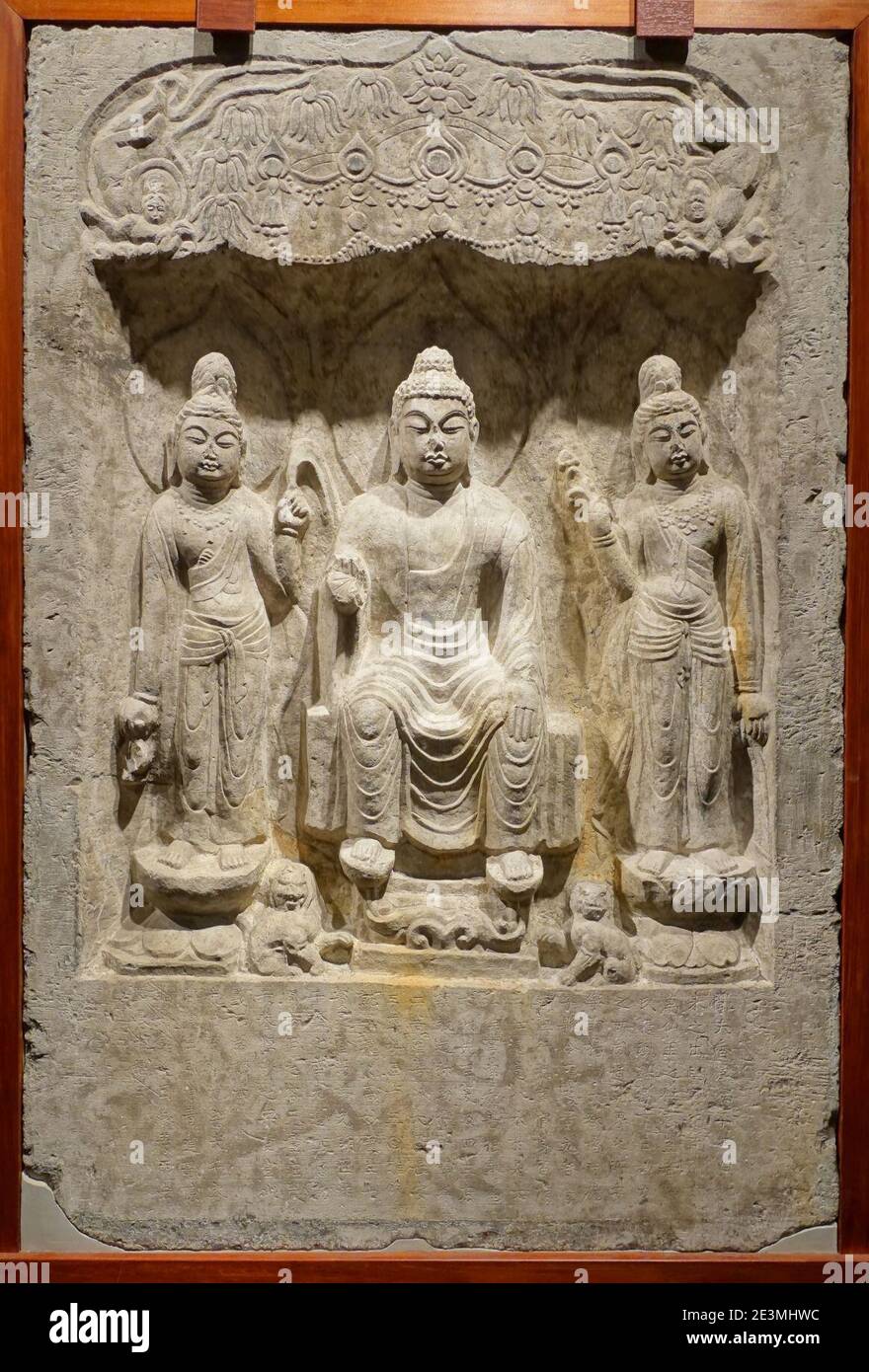 Maitreya triad in a niche, Baoqingsi temple, Xi'an, Shaanxi province ...