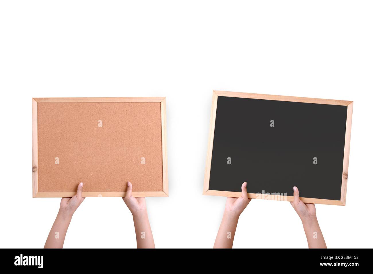 Human hand holding a brown cork board in a frame and blackboard ...