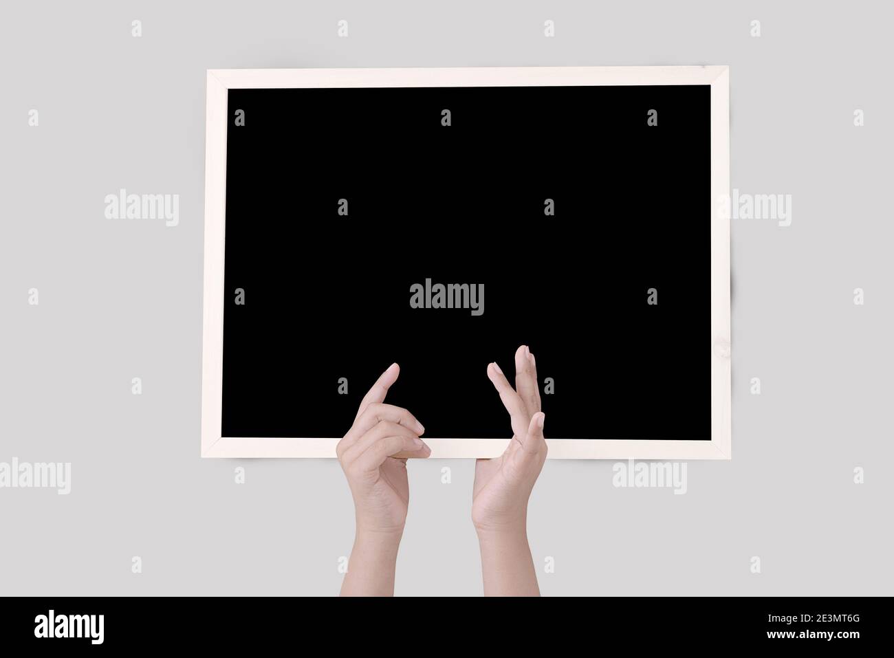 Human hand holding blackboard isolated over white background Stock ...