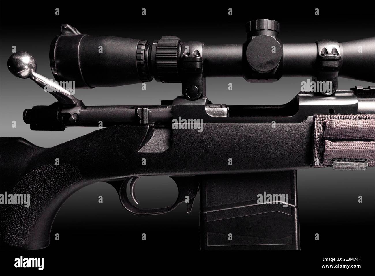bolt action rifle with riflescope close up on black background, copy ...