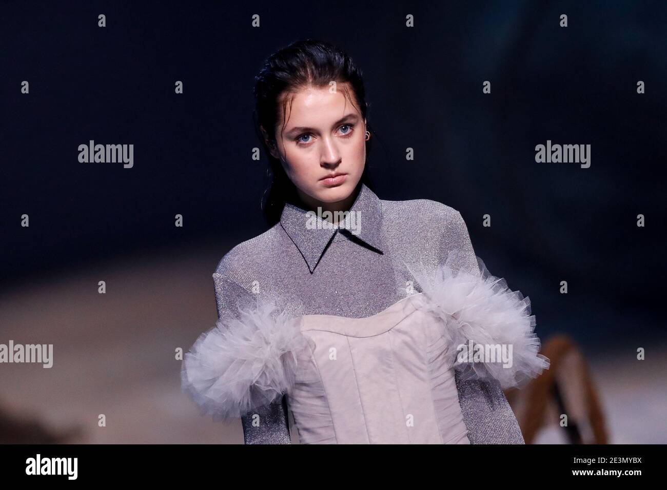 Berlin, Germany. 19th Jan, 2021. Models show a creation by designer ...