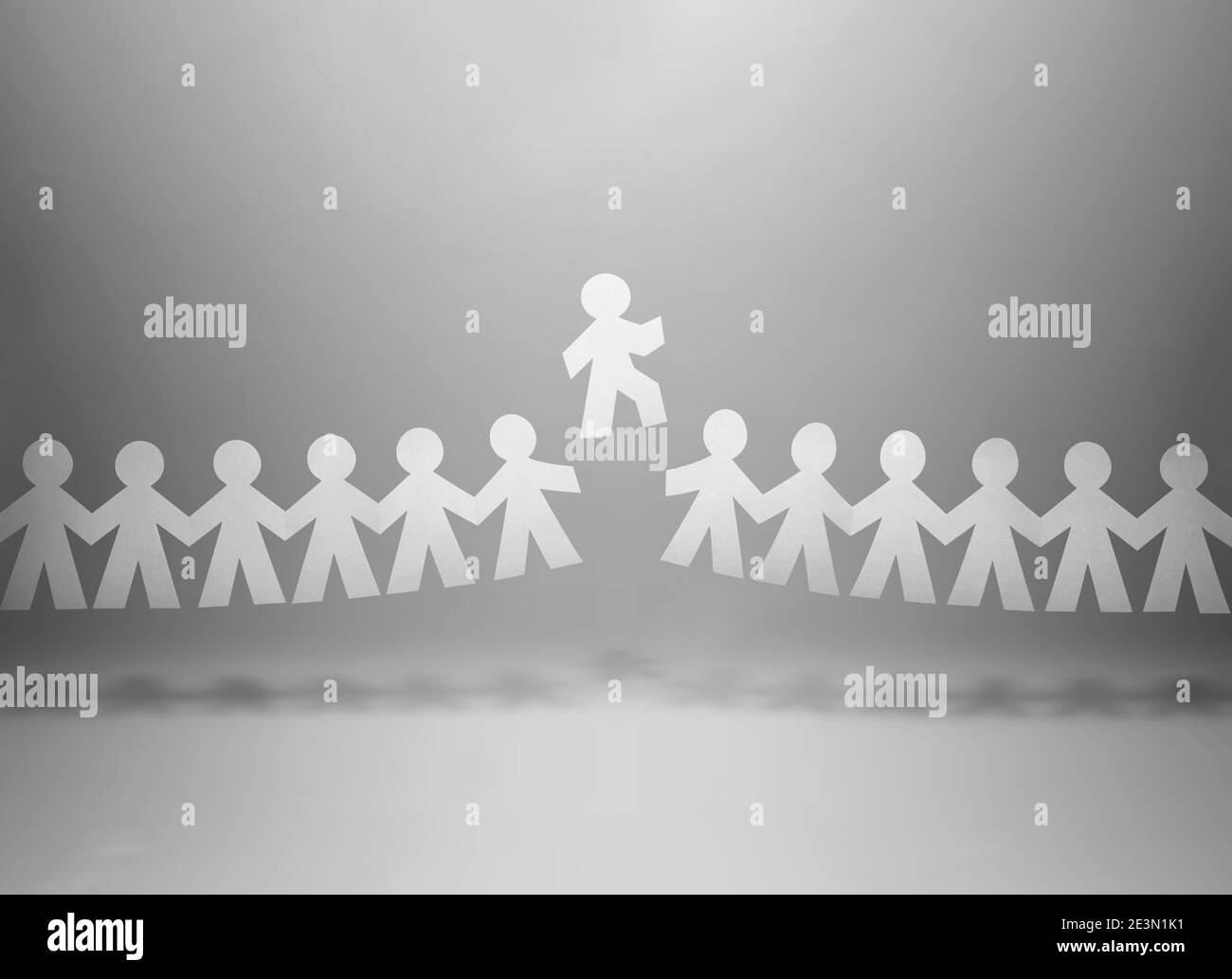 Member of team standing out from the crowd with grey background Stock ...