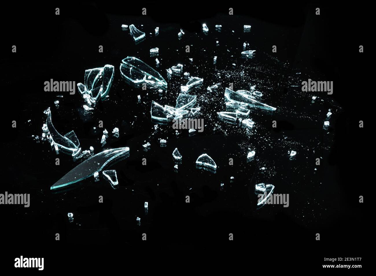 broken glass with sharp Pieces over black Stock Photo - Alamy