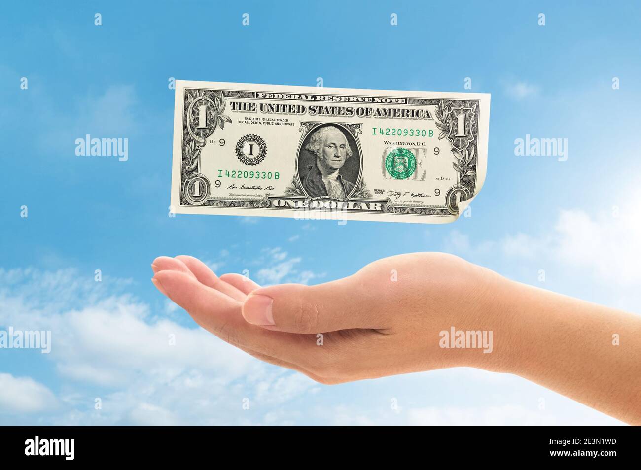 money falling into hand Stock Photo - Alamy