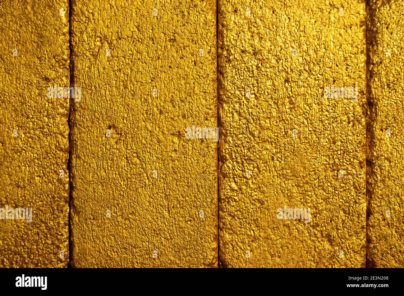 Yellow golden brick wall Stock Photo - Alamy