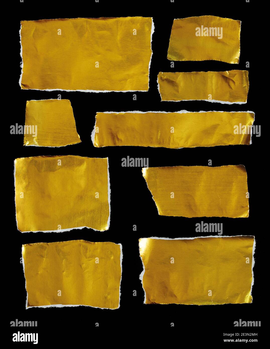 Collection of gold ripped pieces of paper on black background Stock ...