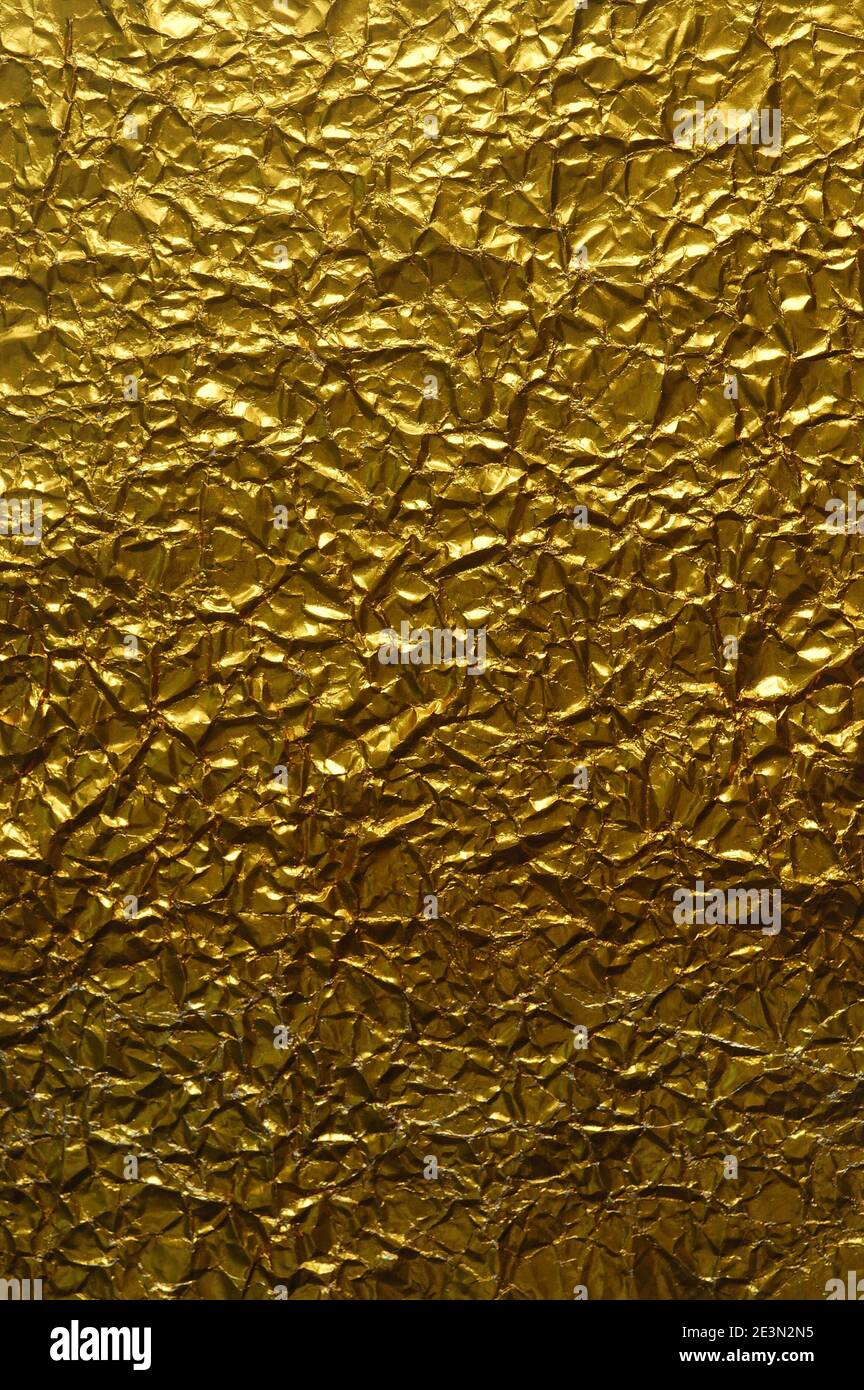 Crumpled gold hi-res stock photography and images - Alamy