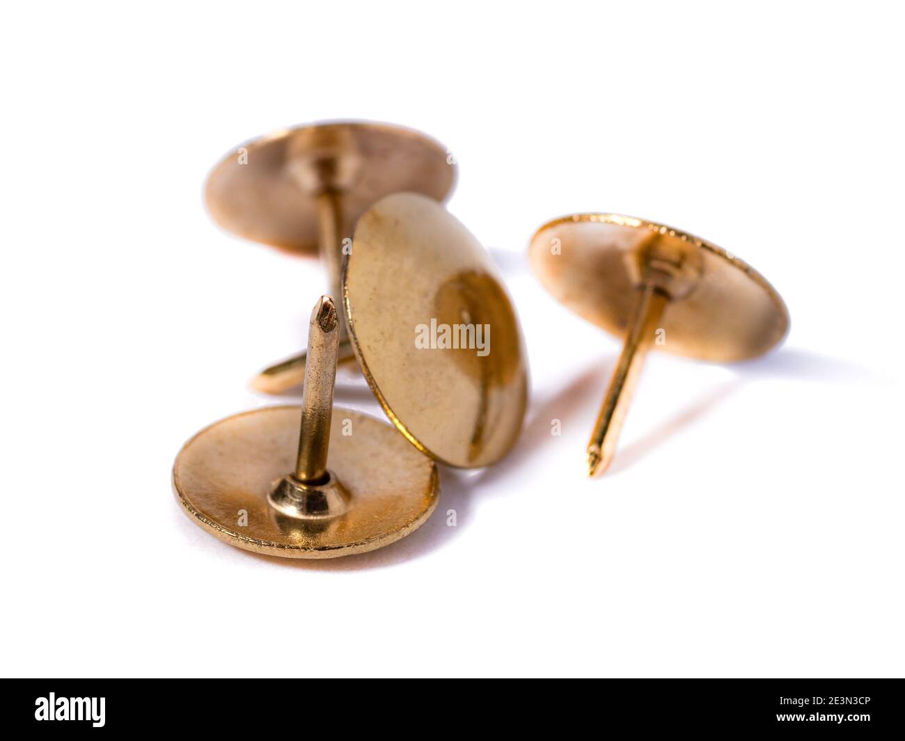 Closeup metal tacks isolated on a white. Office concept Stock Photo - Alamy