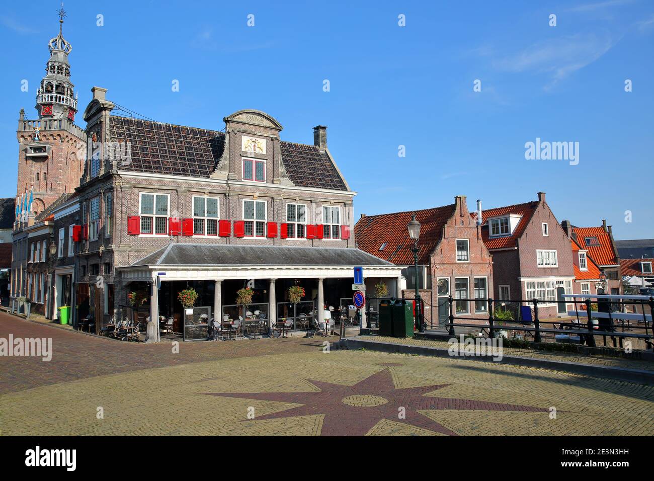 Historic house facades located at the harbor of Monnickendam, North ...