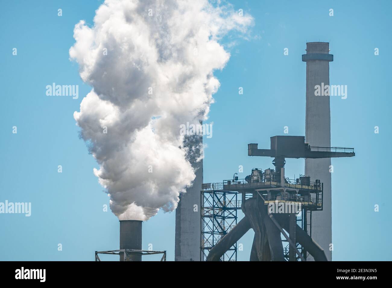Smoke or steam emissions from steel mill factory - Industrial pollution ...