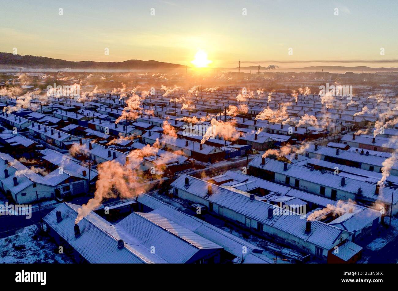 Hulun Buir, China. 20th Jan, 2021. The golden light during sunrise wake ...