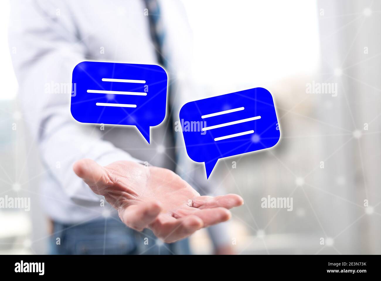 Dialogue concept above the hand of a man in background Stock Photo - Alamy