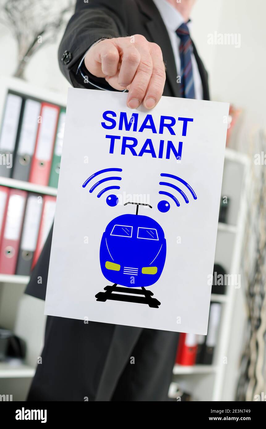 Paper showing smart train concept held by a businessman Stock Photo - Alamy
