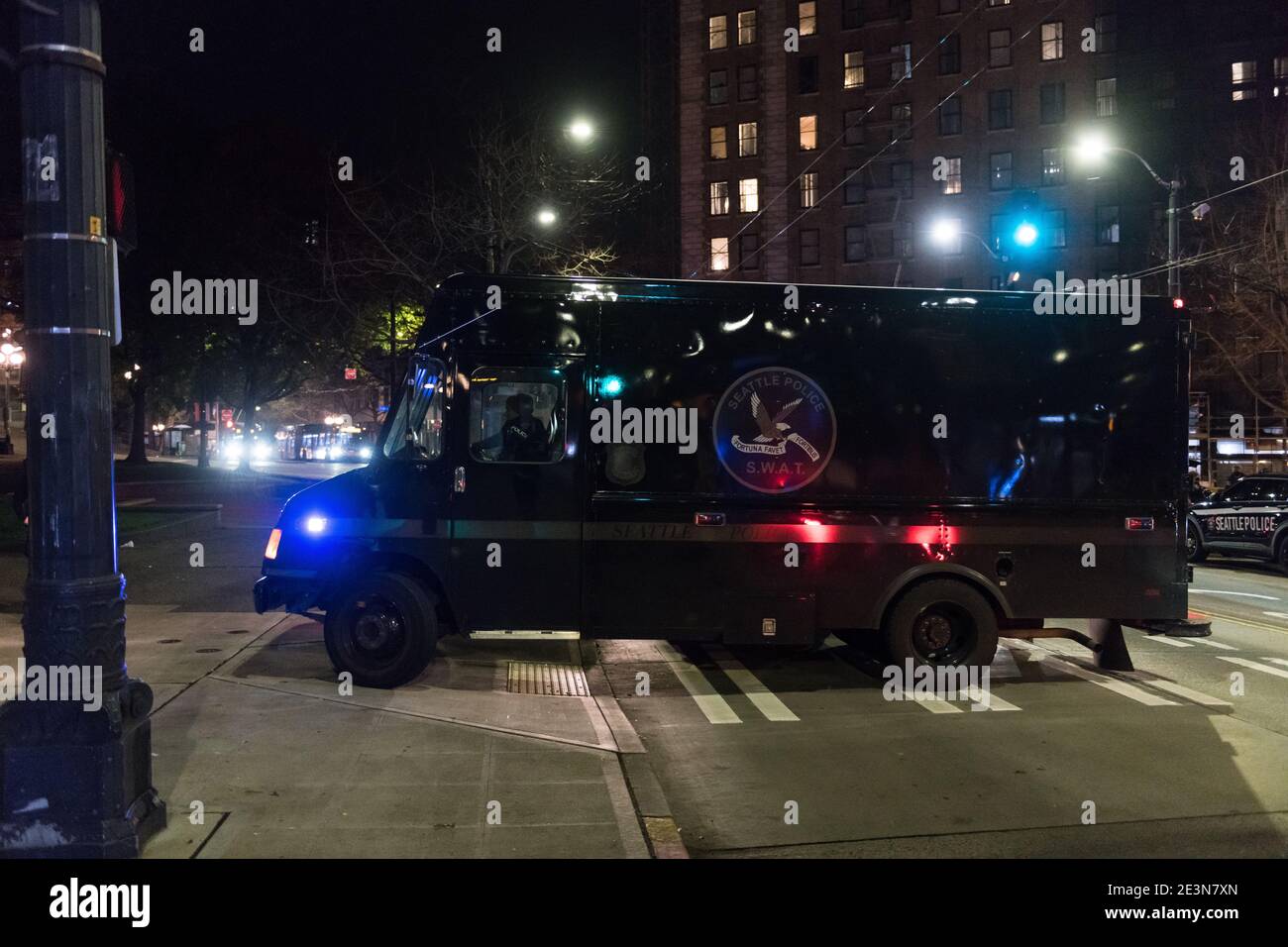 Seattle, USA. 19th Jan, 2021. Late in the night the Seattle swat ...
