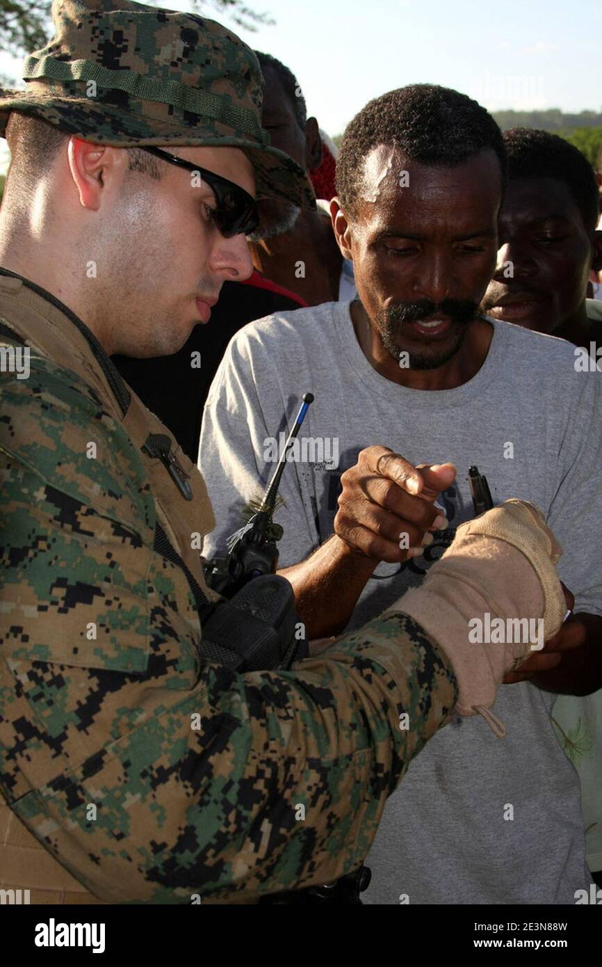 Marine learns the language Stock Photo - Alamy