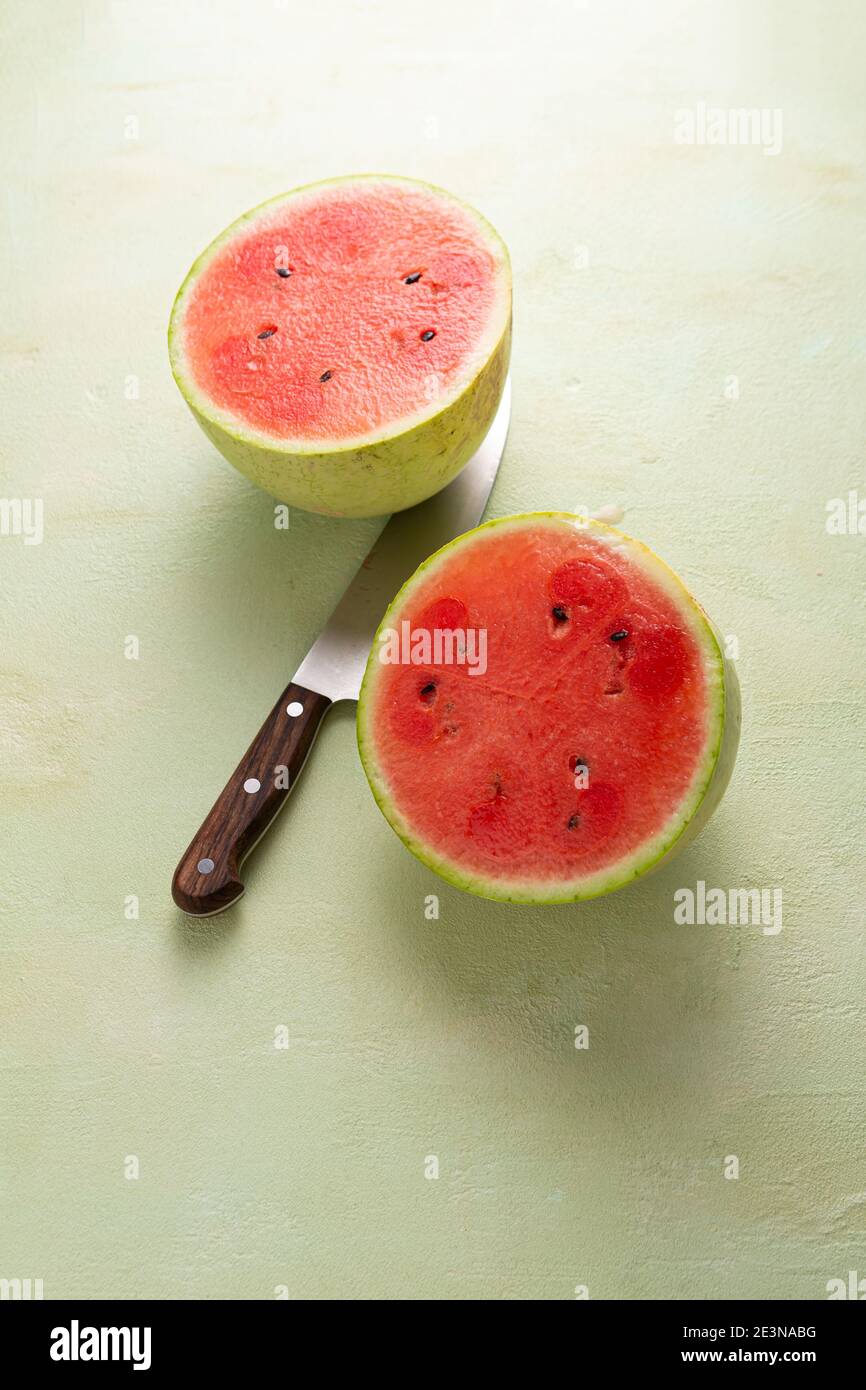 Watermelon halves hi-res stock photography and images - Alamy