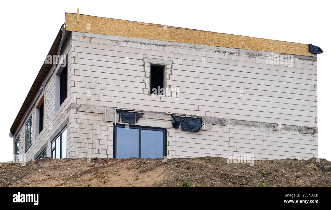 The building of unfinished rural house on sand hill. Isolated on white ...