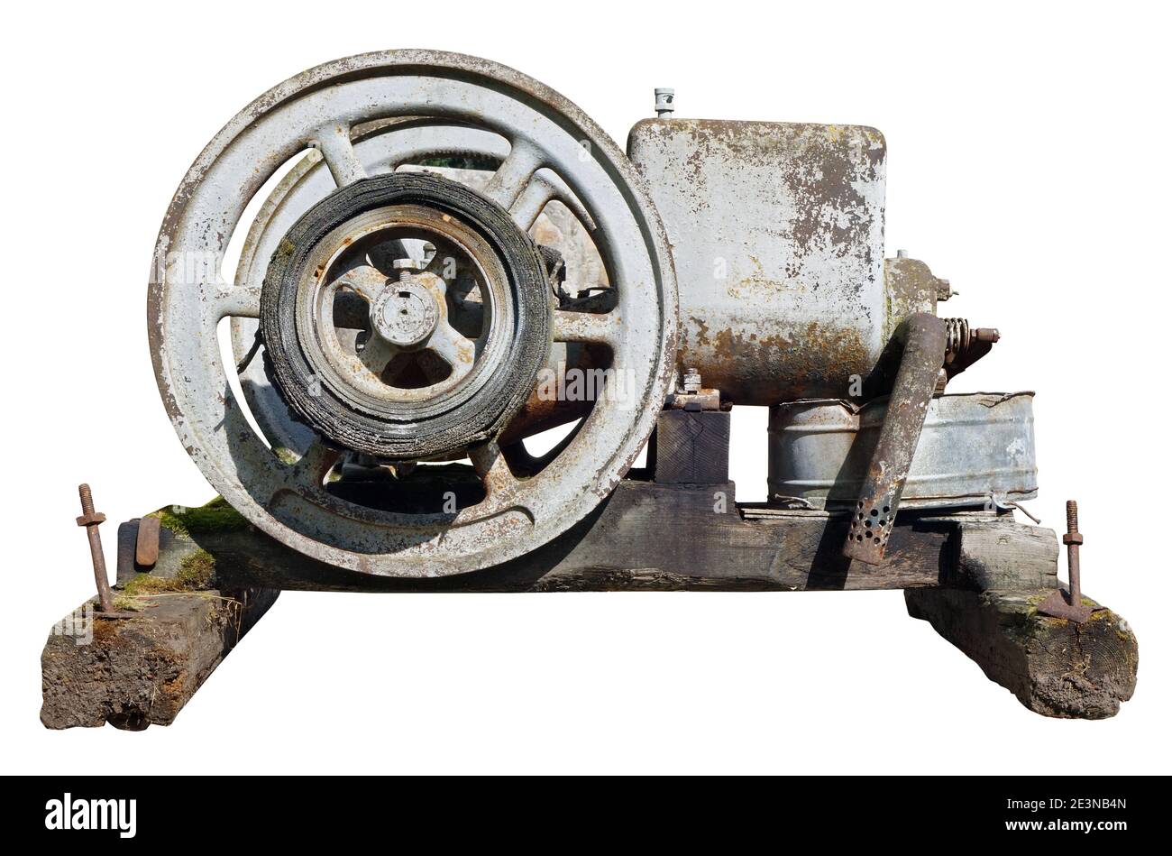 Rusty vintage small tractors diesel engine was painted white. Isolated ...