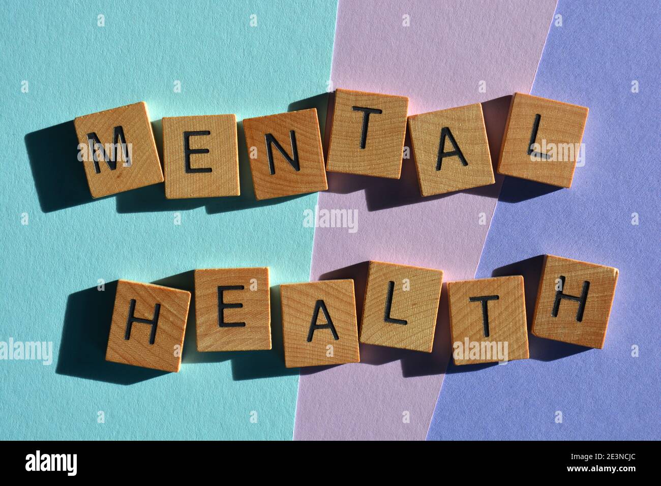 Mental Health, words in wooden alphabet letters isolated on pastel ...