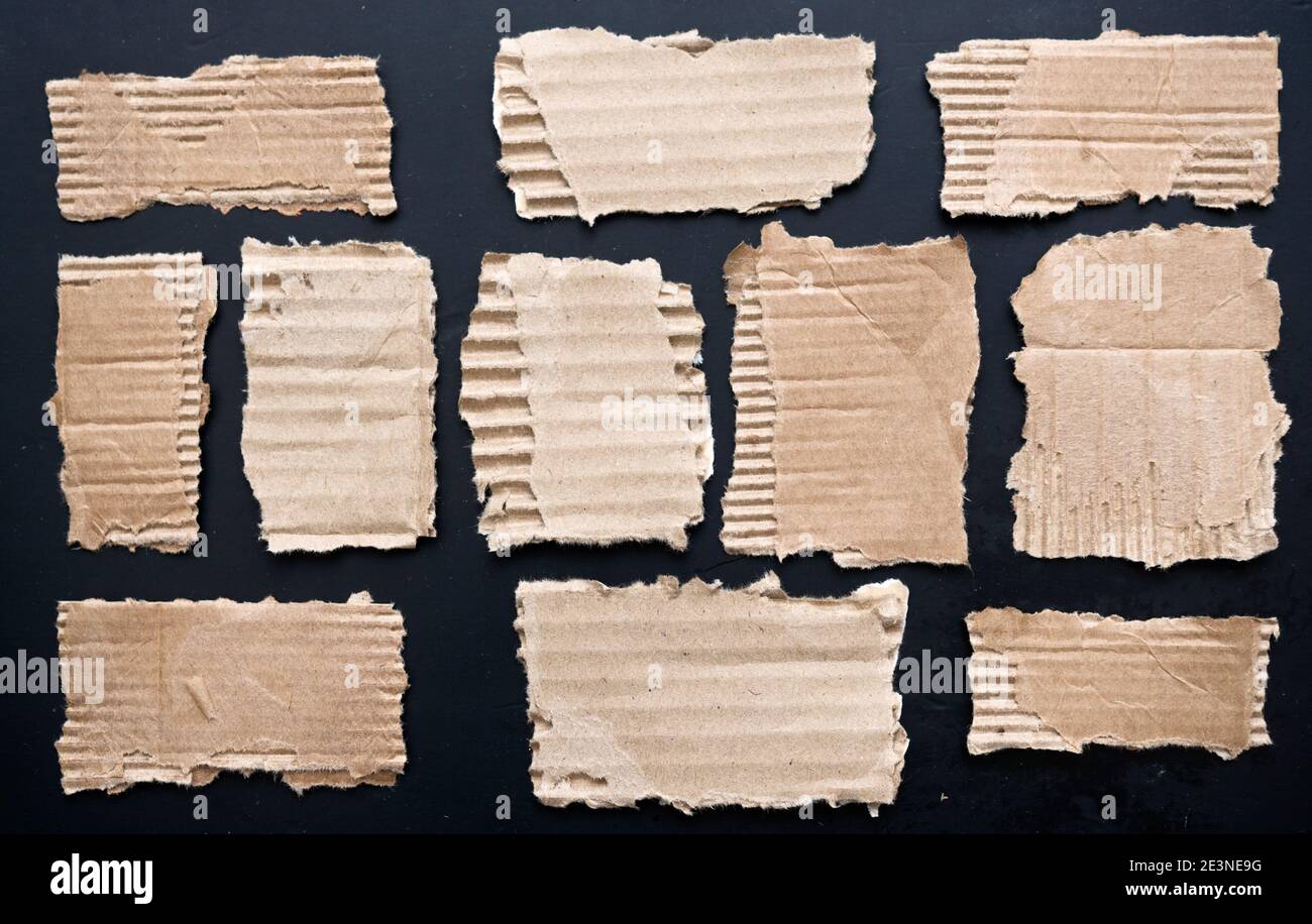 Cardboard scraps isoalted on white background Stock Photo - Alamy
