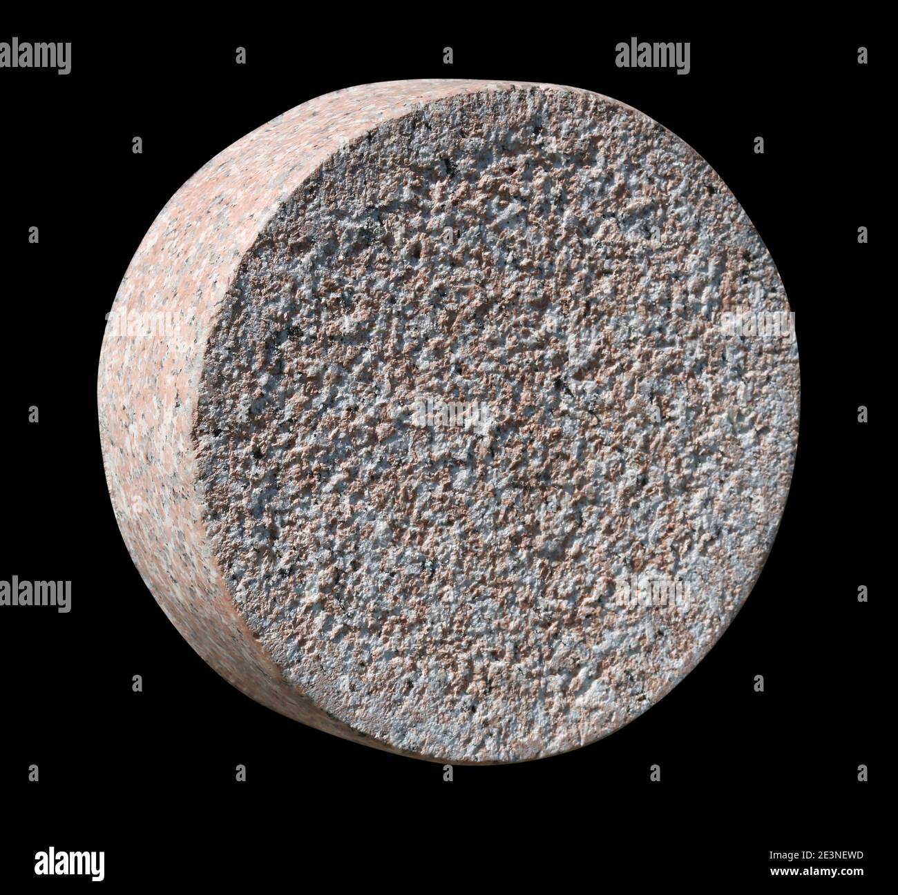 Stone handmade rough granite wheel isolated on black Stock Photo - Alamy