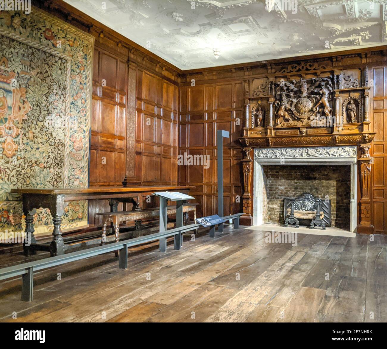 The Old Palace, Bromley-by-Bow. Oak paneled room with carved Doric ...
