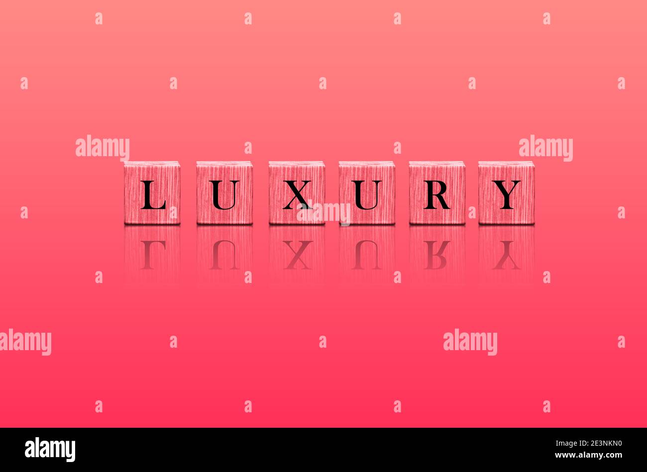 Luxury word Wood blocks isolated on Luxurious pink background Stock ...