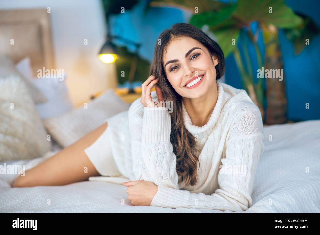Young beautiful woman smiling and feeling awesome Stock Photo - Alamy
