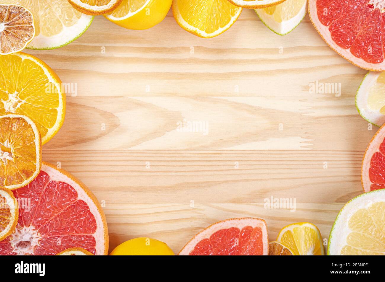 citrus frame template on wooden background. Fresh citrus fruits. Top ...