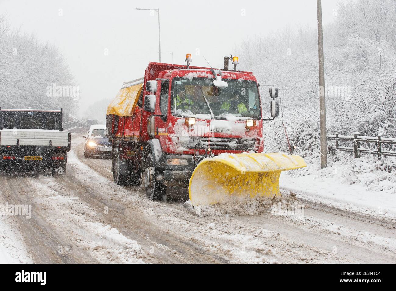 A snow plough and grit spreader works to clear the roads in Barnsley ...