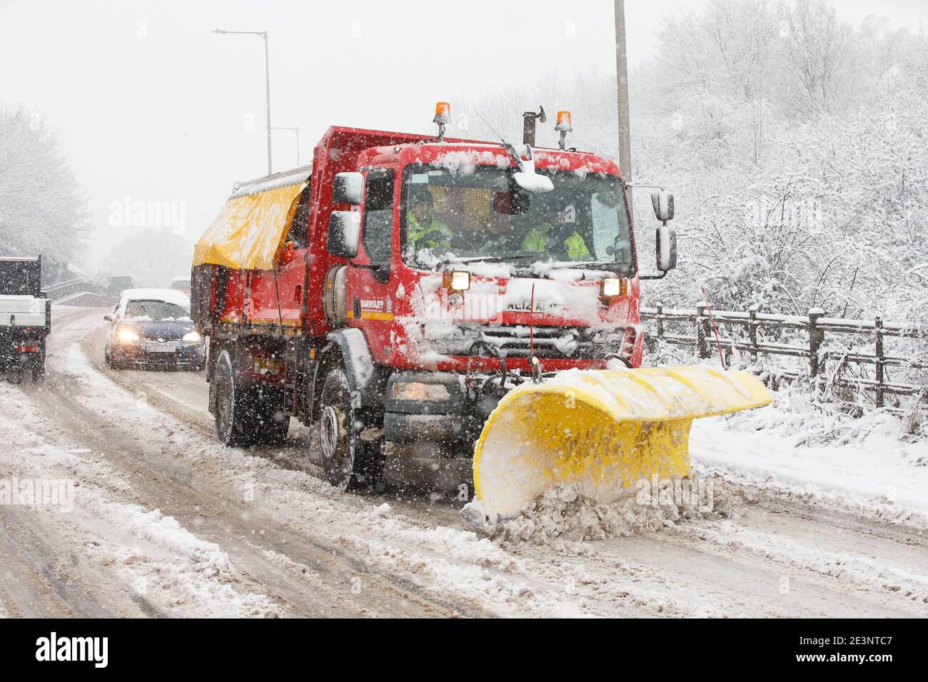 A snow plough and grit spreader works to clear the roads in Barnsley ...