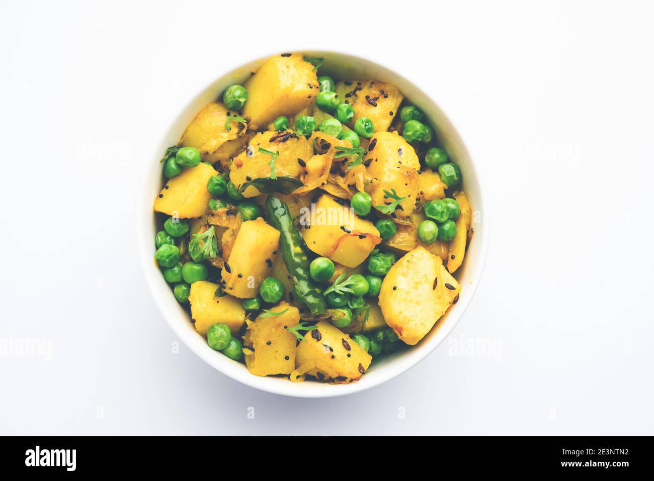 Aloo Mutter or Matar aalu dry sabzi, Indian Potato and green Peas fried ...