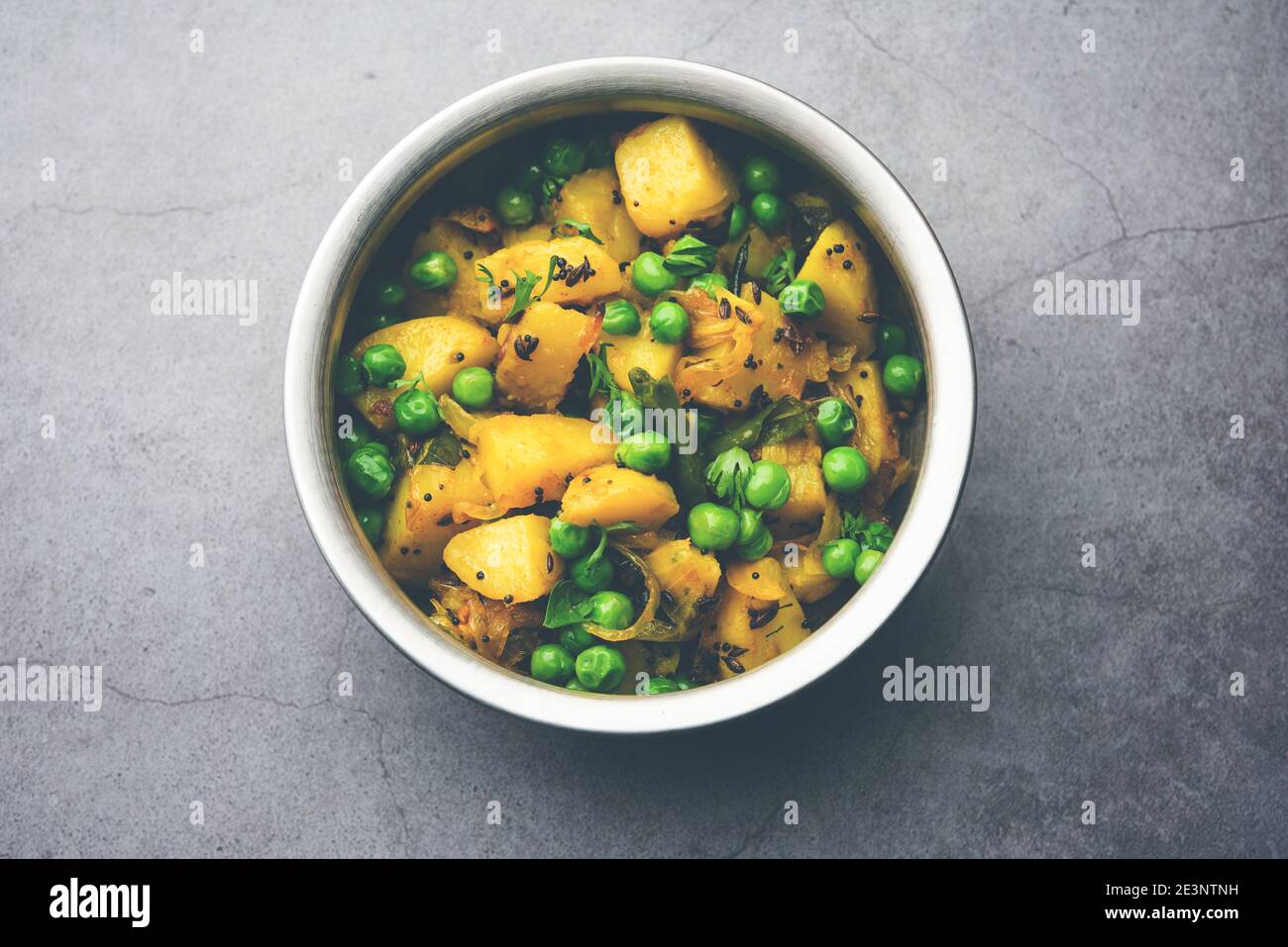 Aloo Mutter or Matar aalu dry sabzi, Indian Potato and green Peas fried ...