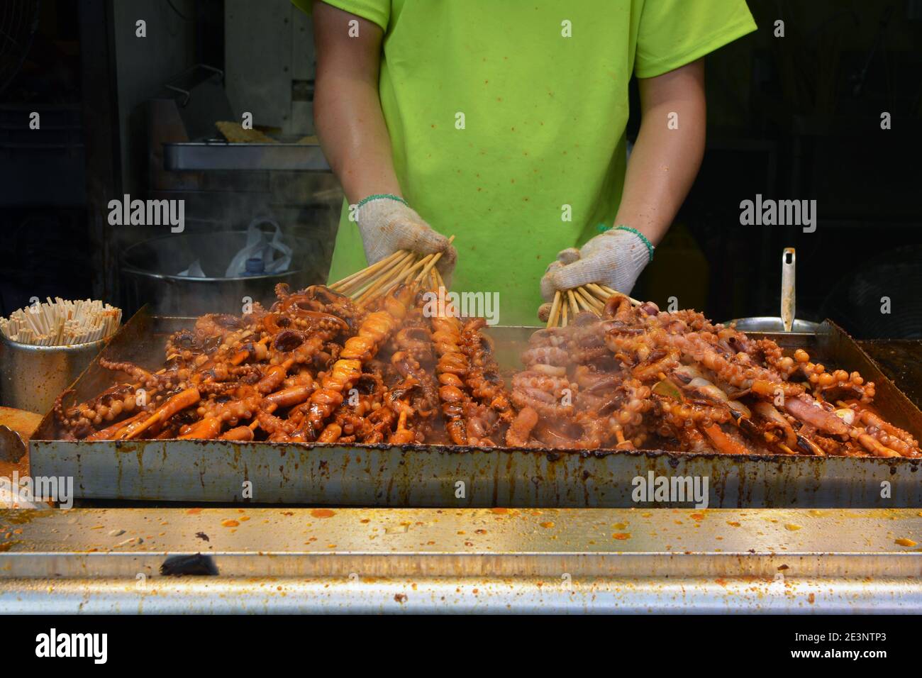 Street food in Shenzhen, sticks of seafood like squid and cuttlefish ...